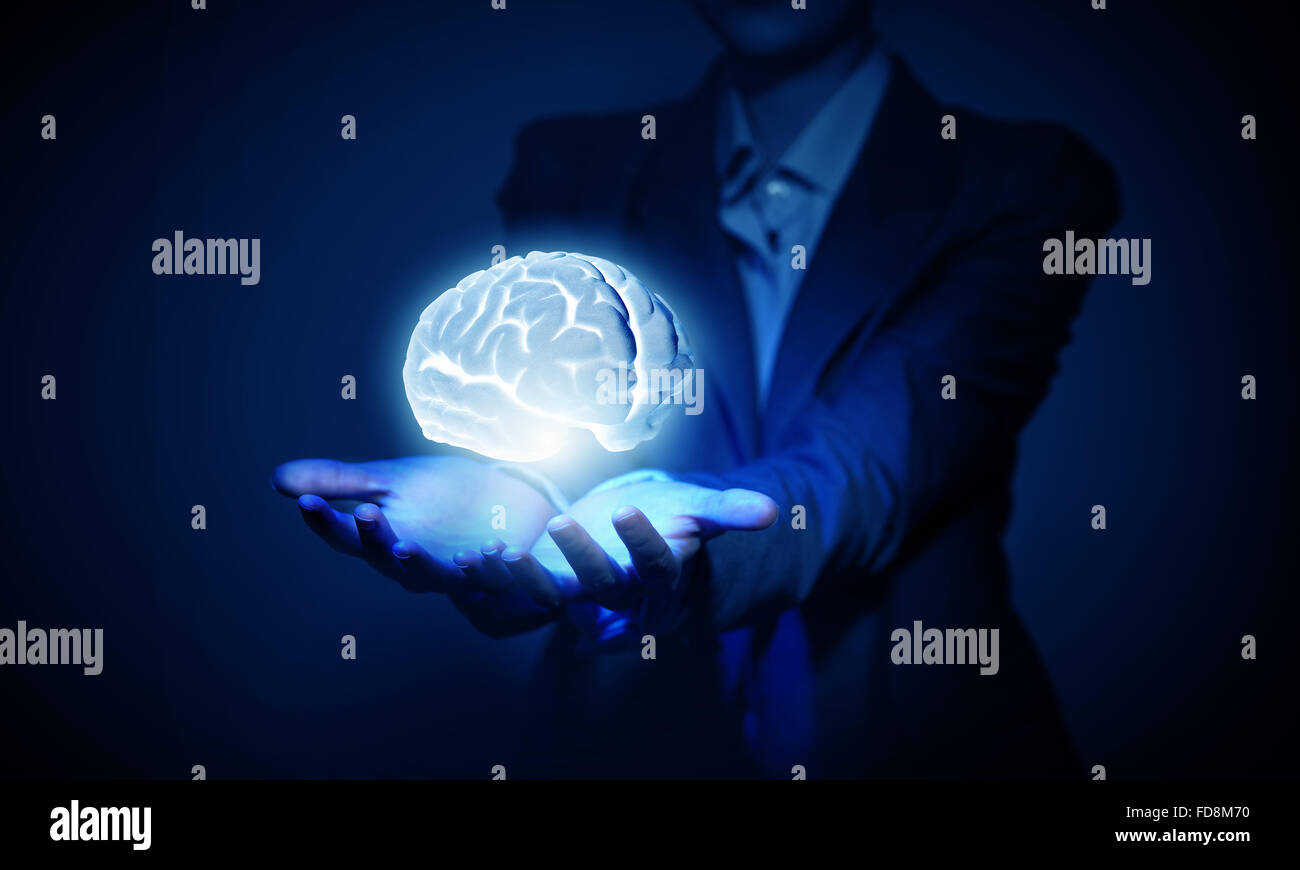 Brain in hand hi-res stock photography and images - Alamy