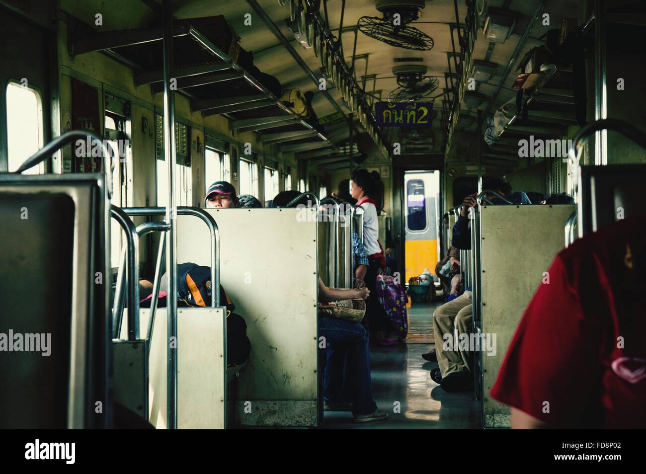 Commuter commuters sitting hi-res stock photography and images - Alamy