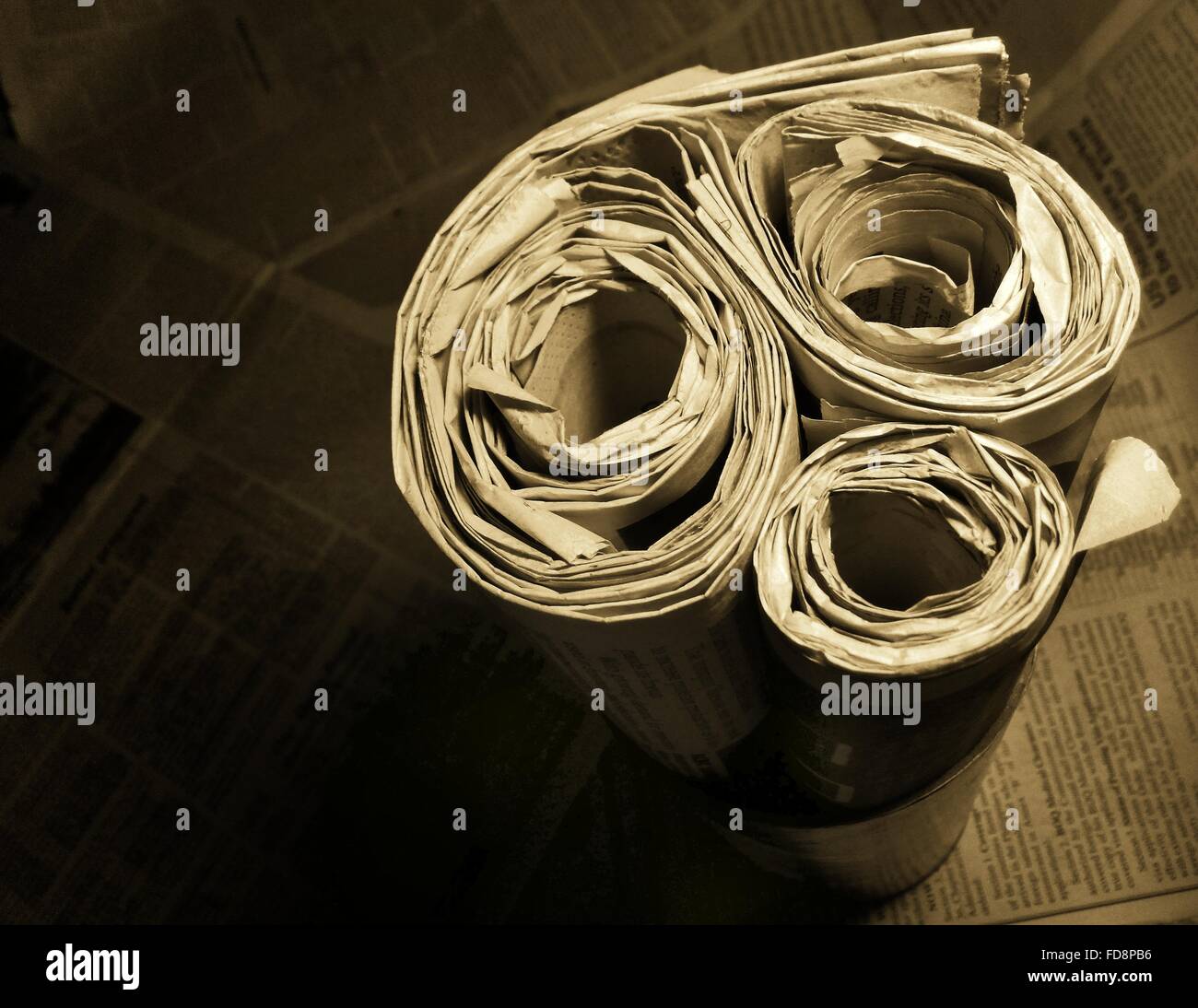 Rolled up newspaper hi-res stock photography and images - Alamy