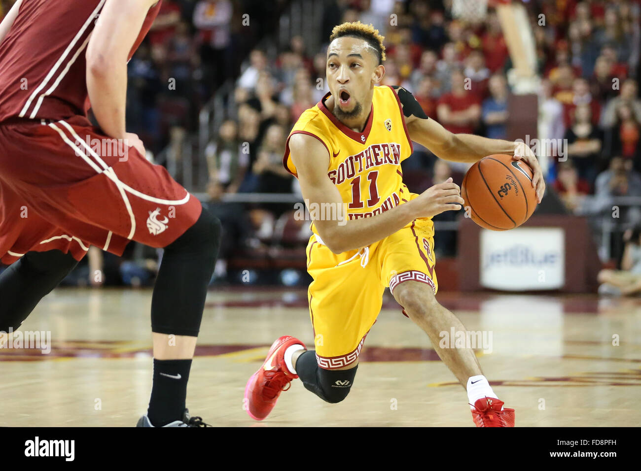 Los Angeles, CA, USA. 28th Jan, 2016. USC Trojans guard Jordan McLaughlin #11 looks for a pass ...