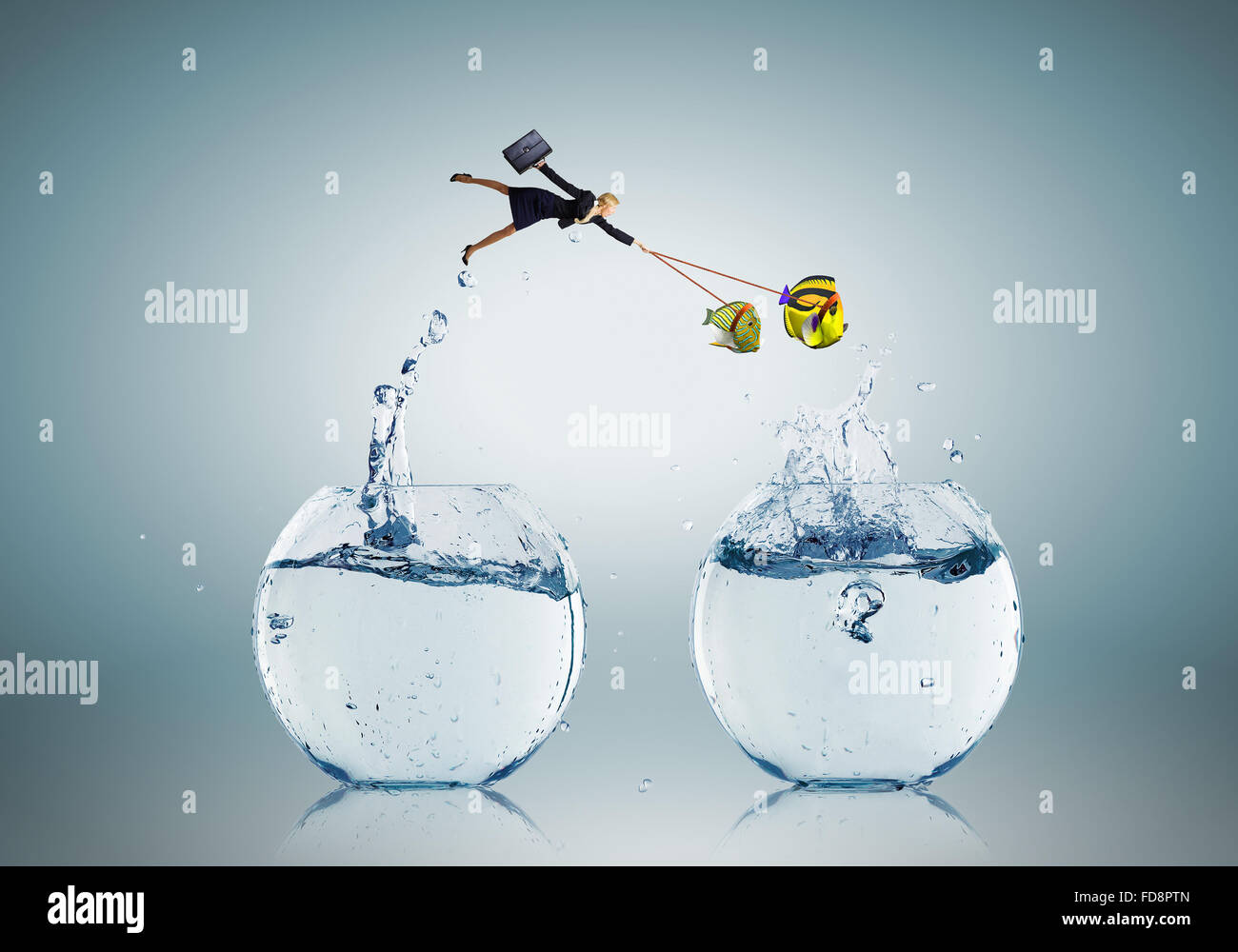 Young businesswoman and big exotic fish. Success in business Stock ...