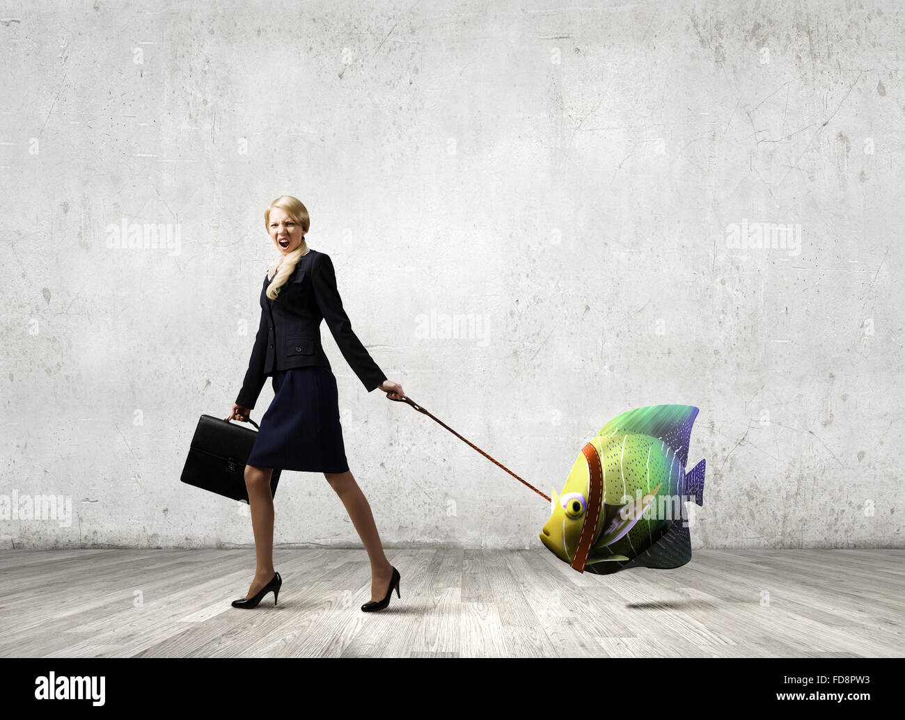 Young businesswoman and big exotic fish. Success in business Stock ...