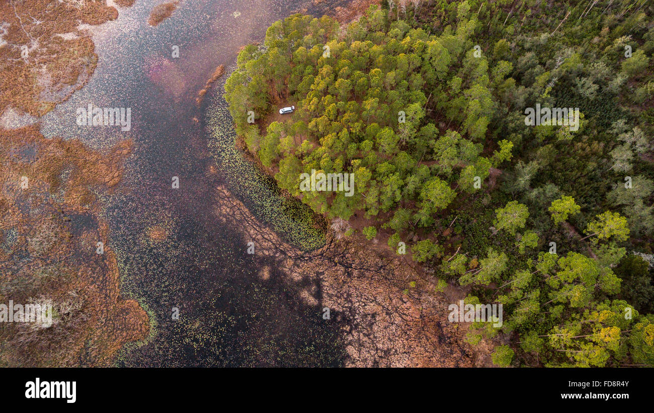 Overhead scenic of automobile at edge of nature, Church Lake Prairie ...