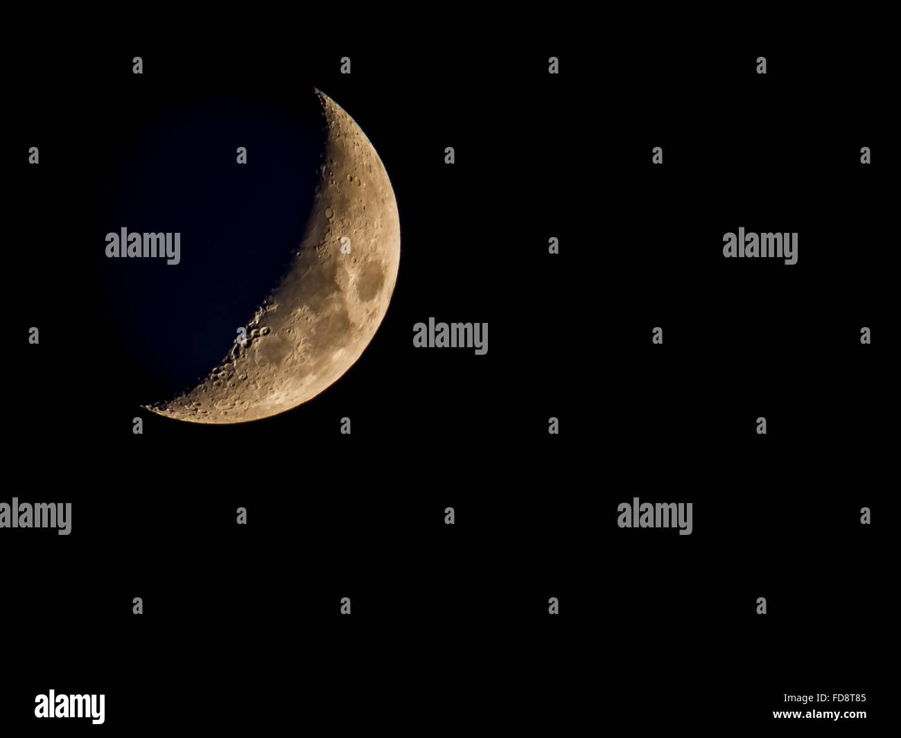 The yellow moon isolated on black Stock Photo - Alamy