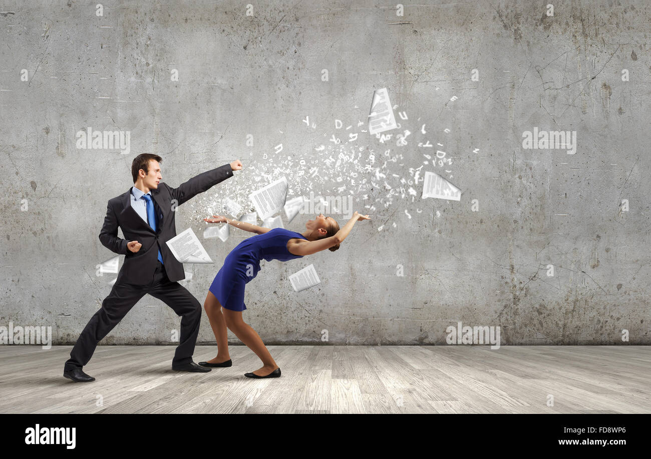 Two businesspeople in anger fighting with each other Stock Photo - Alamy