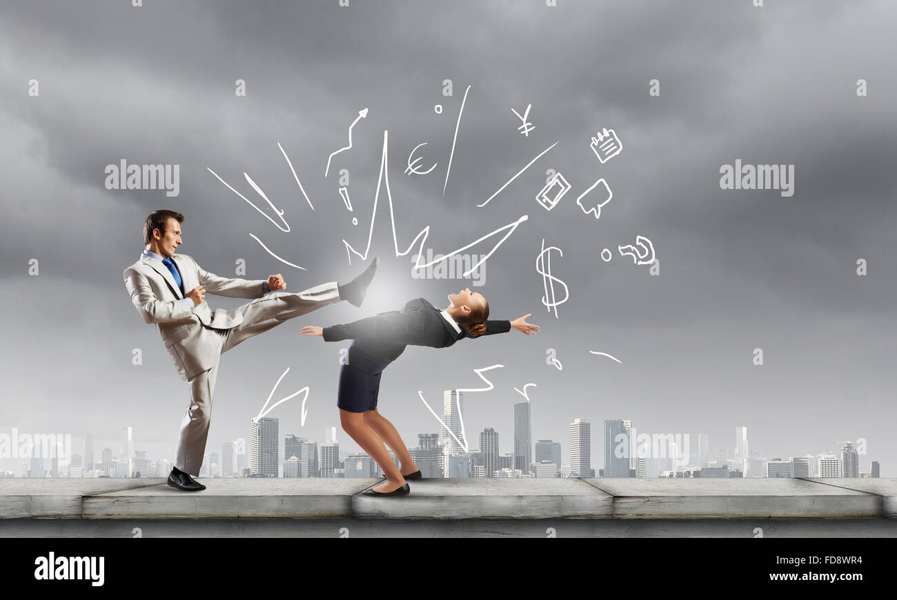 Two businesspeople in anger fighting with each other Stock Photo - Alamy