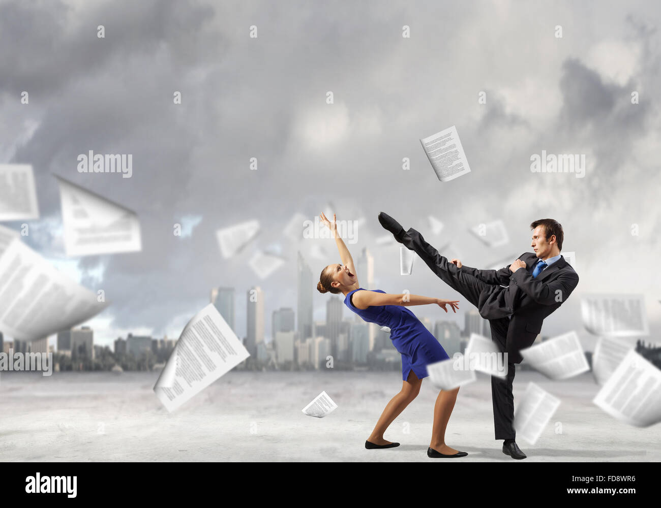 Two businesspeople in anger fighting with each other Stock Photo - Alamy
