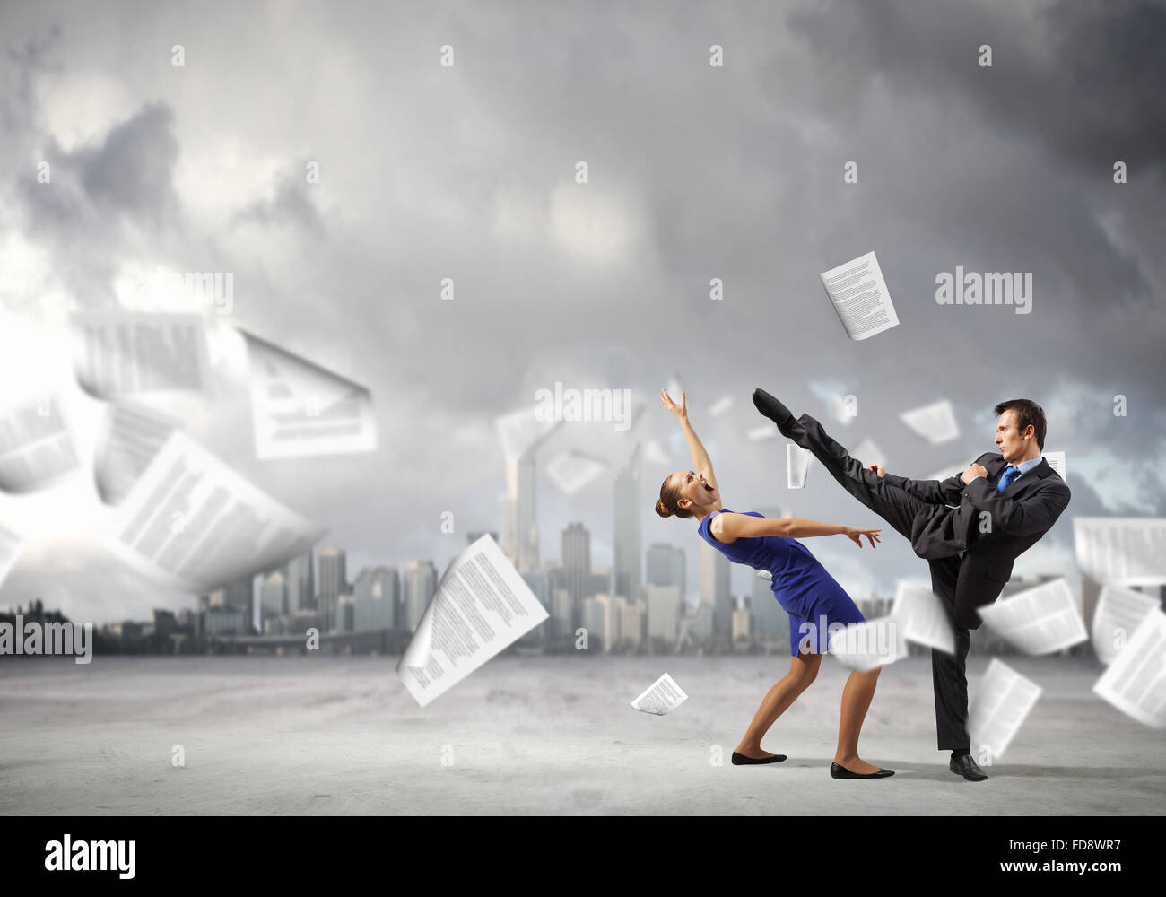 Two businesspeople in anger fighting with each other Stock Photo - Alamy