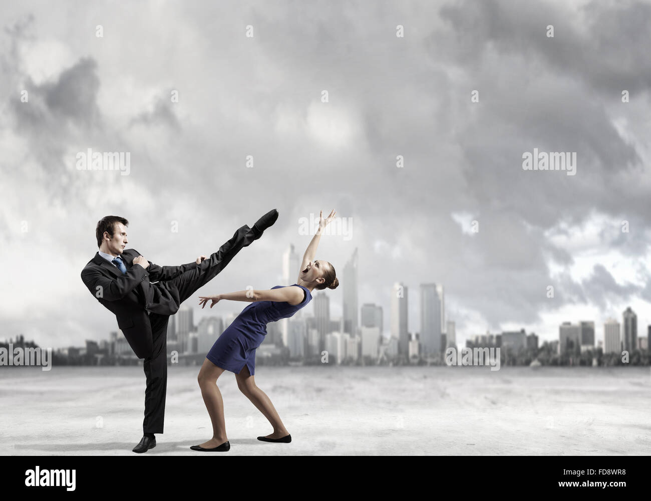 Two businesspeople in anger fighting with each other Stock Photo - Alamy