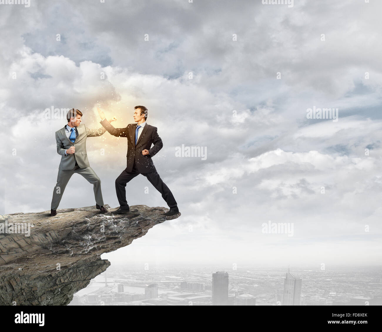 Two businesspeople in anger fighting with each other Stock Photo - Alamy
