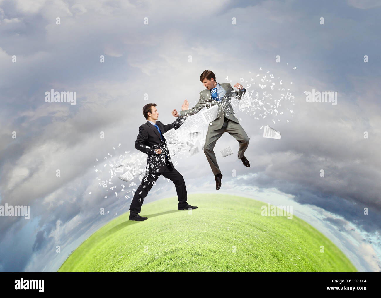 Two businesspeople in anger fighting with each other Stock Photo - Alamy