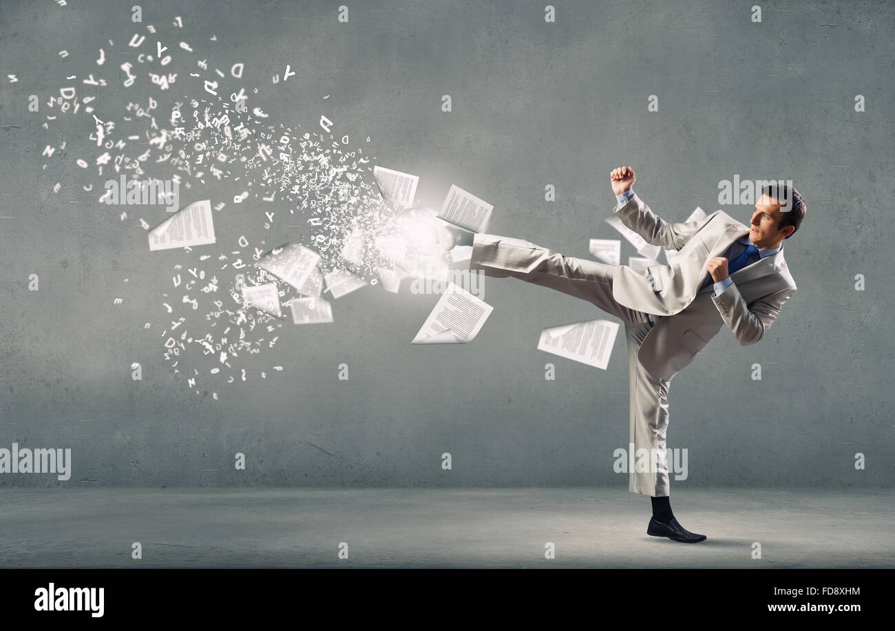 Two businesspeople in anger fighting with each other Stock Photo - Alamy