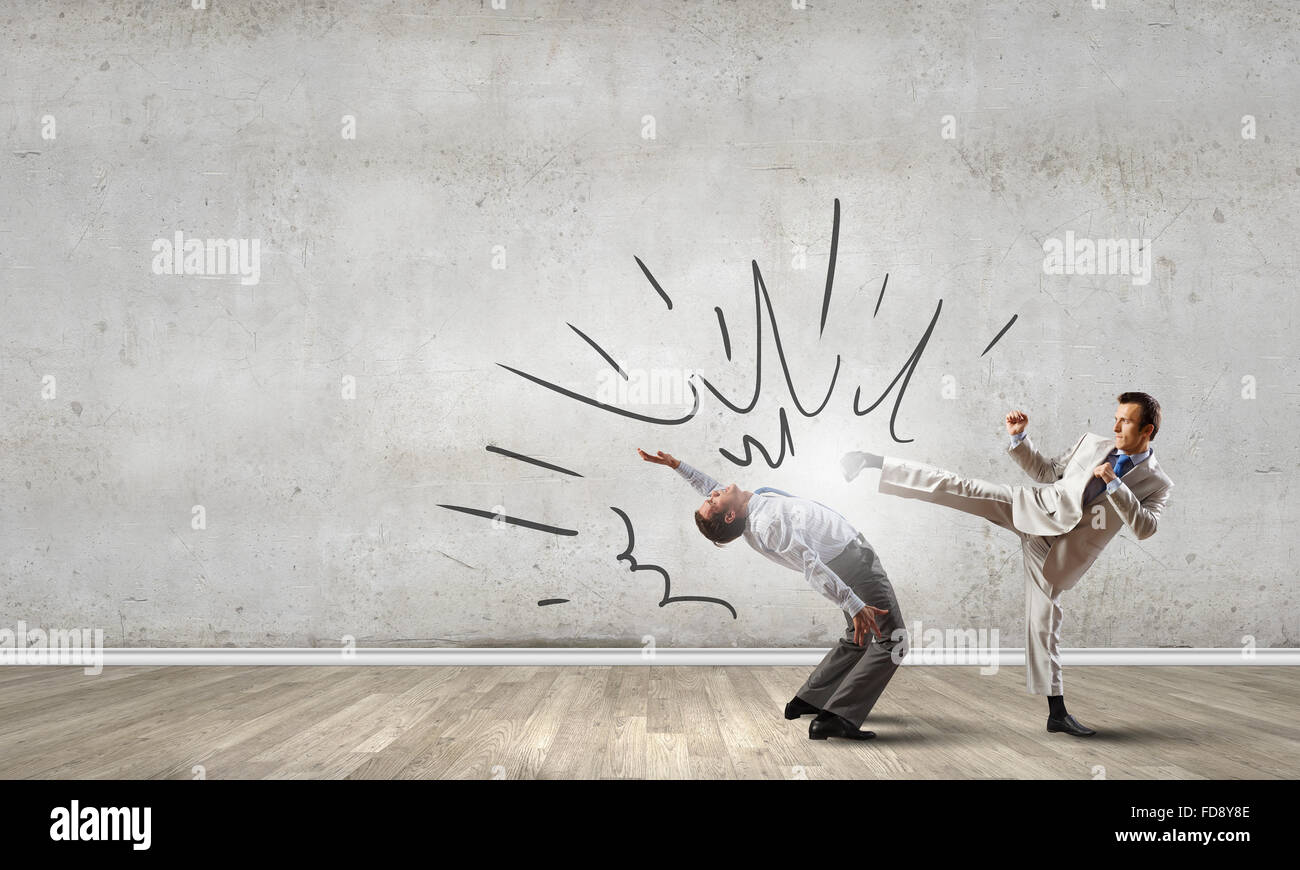 Two businesspeople in anger fighting with each other Stock Photo - Alamy