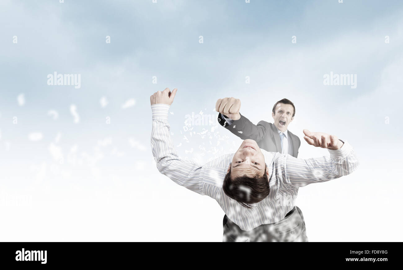 Two businesspeople in anger fighting with each other Stock Photo - Alamy