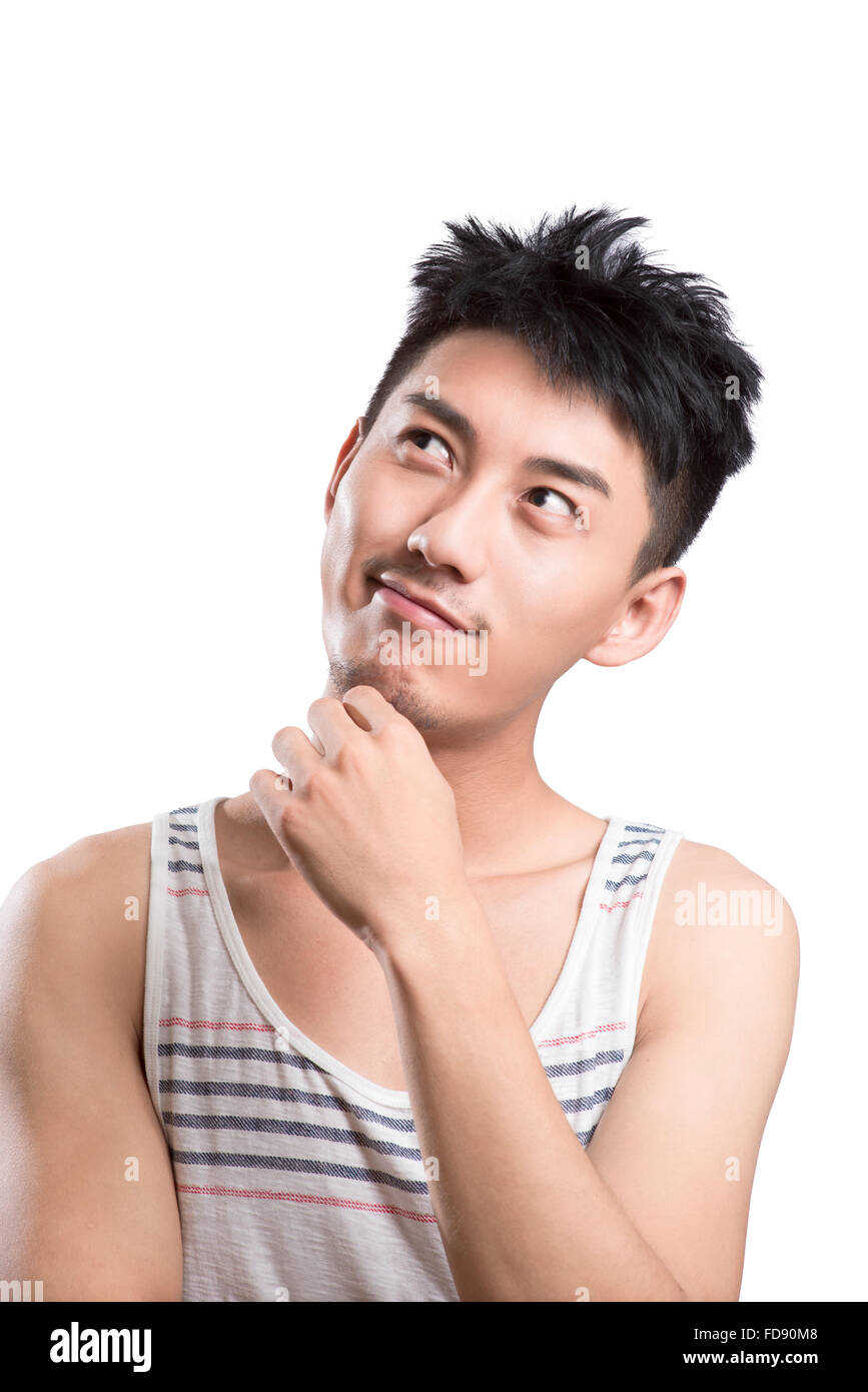 Portrait of young man contemplating Stock Photo - Alamy