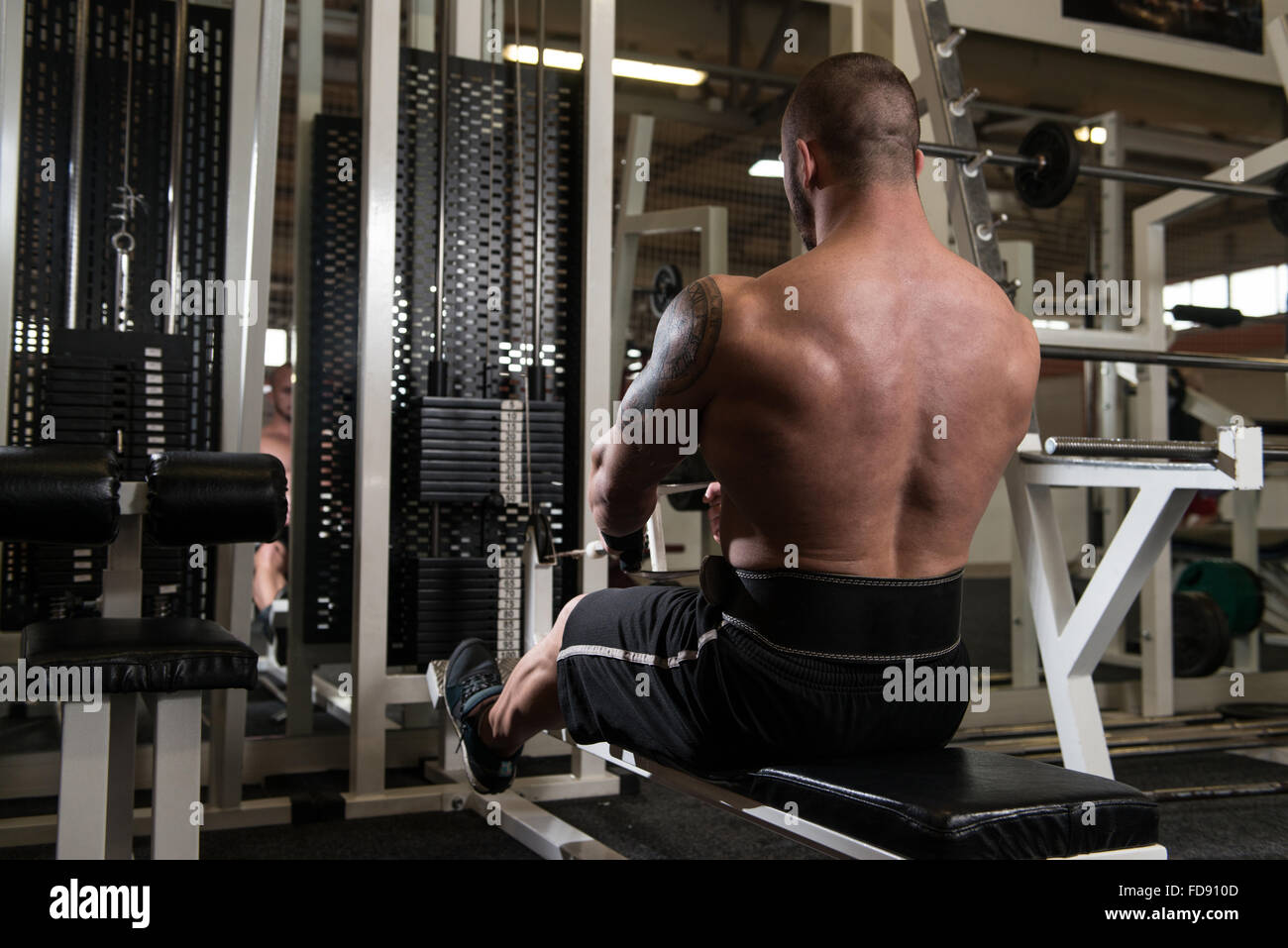 Bodybuilder Doing Back Exercises In The Gym Stock Photo - Alamy