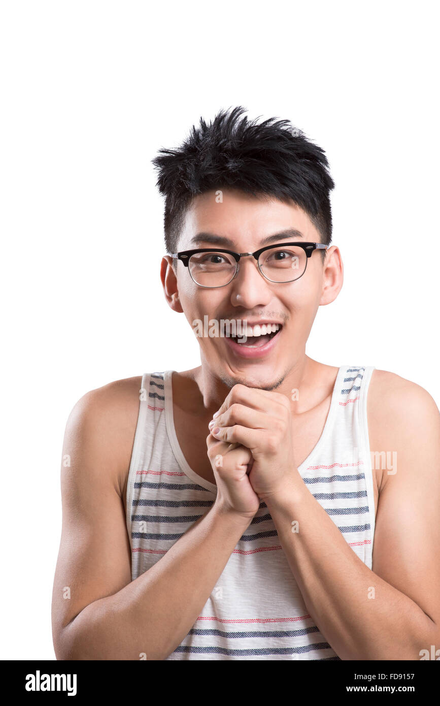 Portrait of young man praying Stock Photo - Alamy