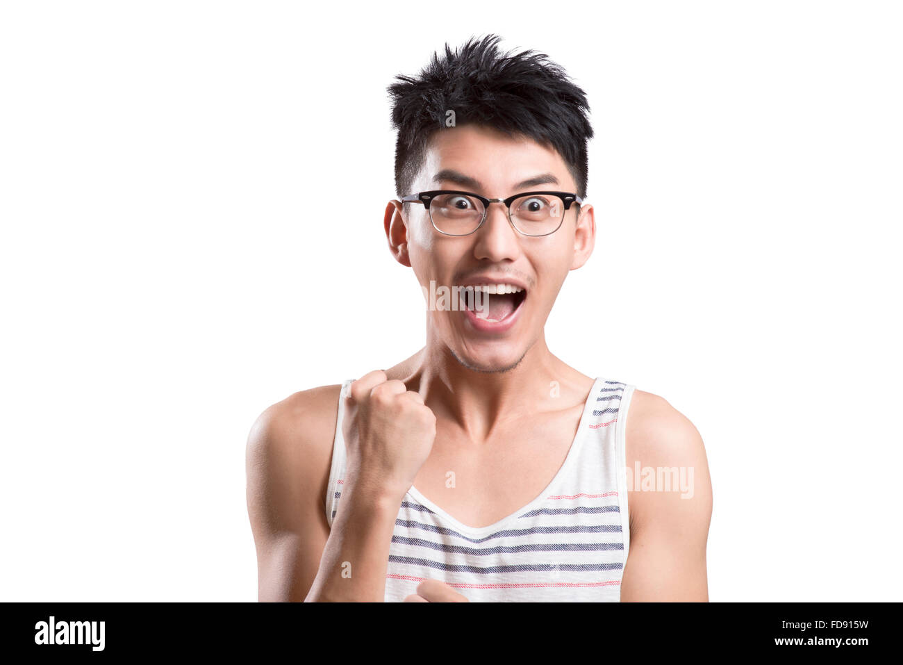 Portrait of young man cheering Stock Photo - Alamy