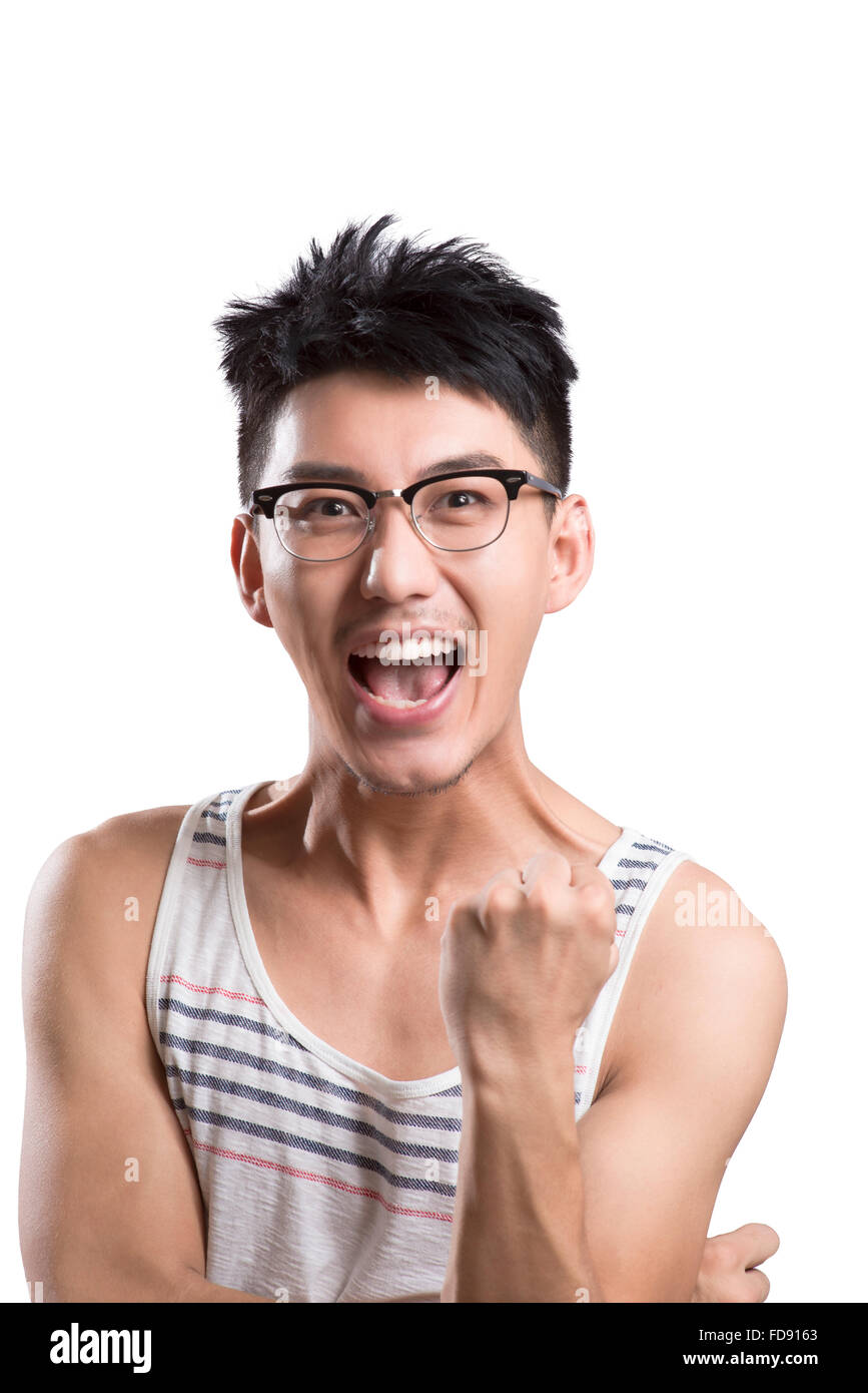 Portrait of young man cheering Stock Photo - Alamy