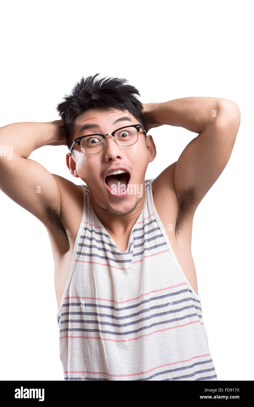 Portrait of young man surprised Stock Photo - Alamy