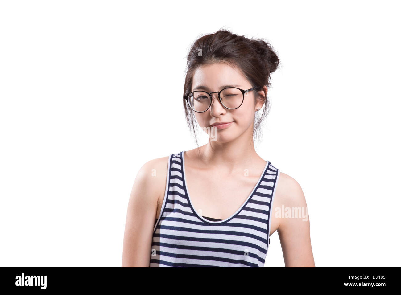 Portrait of young woman blinking Stock Photo - Alamy