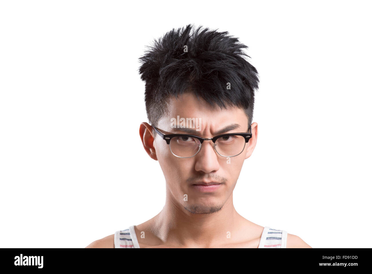 Portrait of young man irritated Stock Photo - Alamy