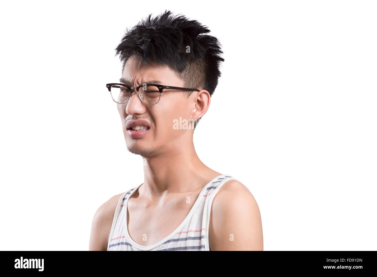 Portrait of young man disgusted Stock Photo - Alamy