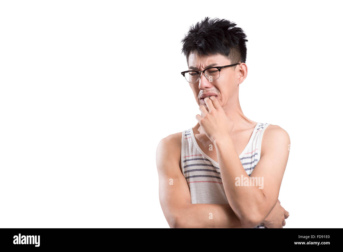 Portrait of young man disgusted Stock Photo - Alamy