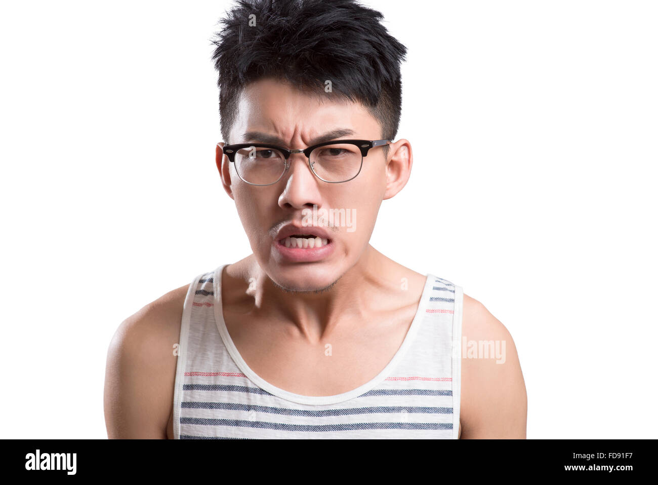 Portrait of young man irritated Stock Photo - Alamy
