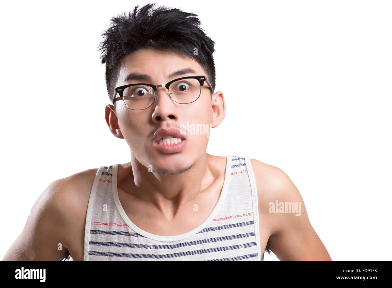 Portrait of young man irritated Stock Photo - Alamy