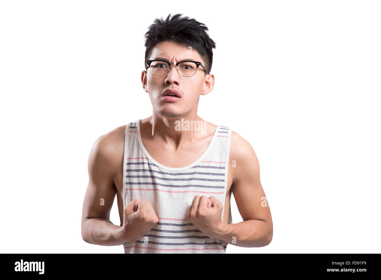 Portrait of young man irritated Stock Photo - Alamy