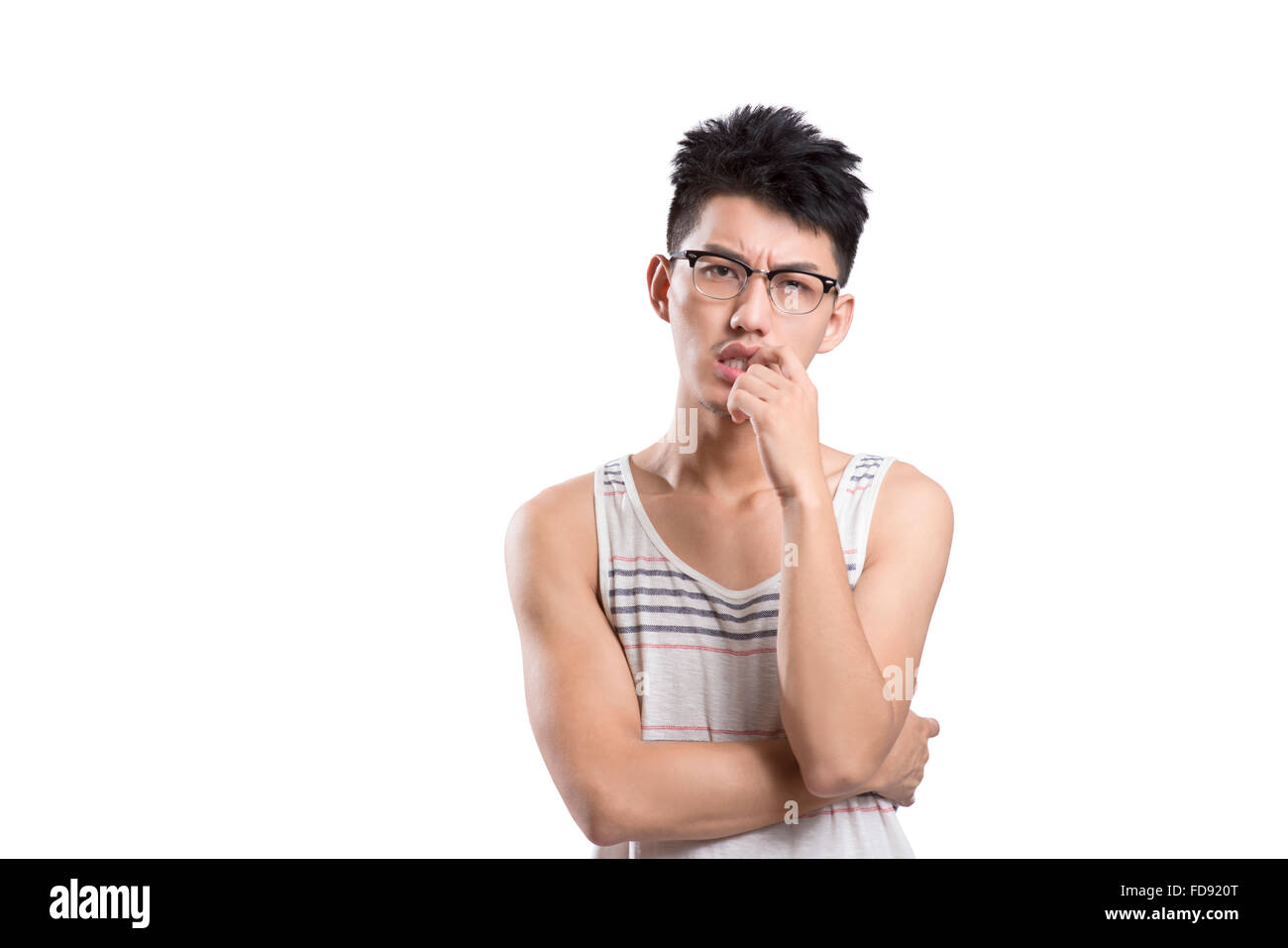 Worried young man biting hi-res stock photography and images - Alamy