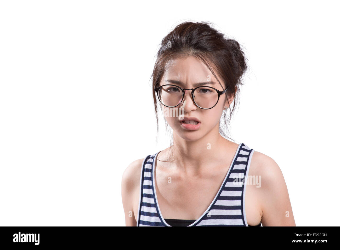Portrait of young woman irritated Stock Photo - Alamy