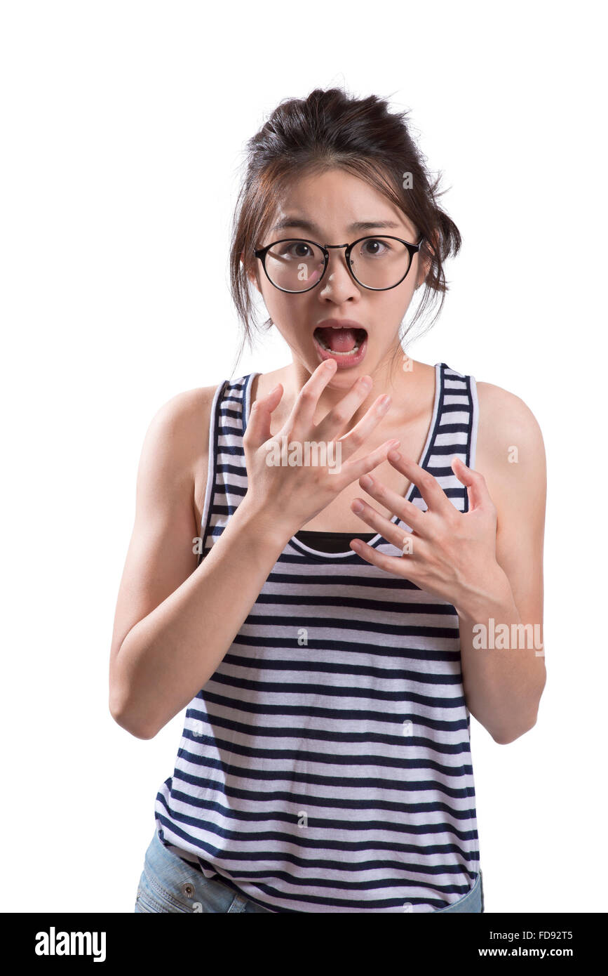 Portrait of young woman horrified Stock Photo - Alamy