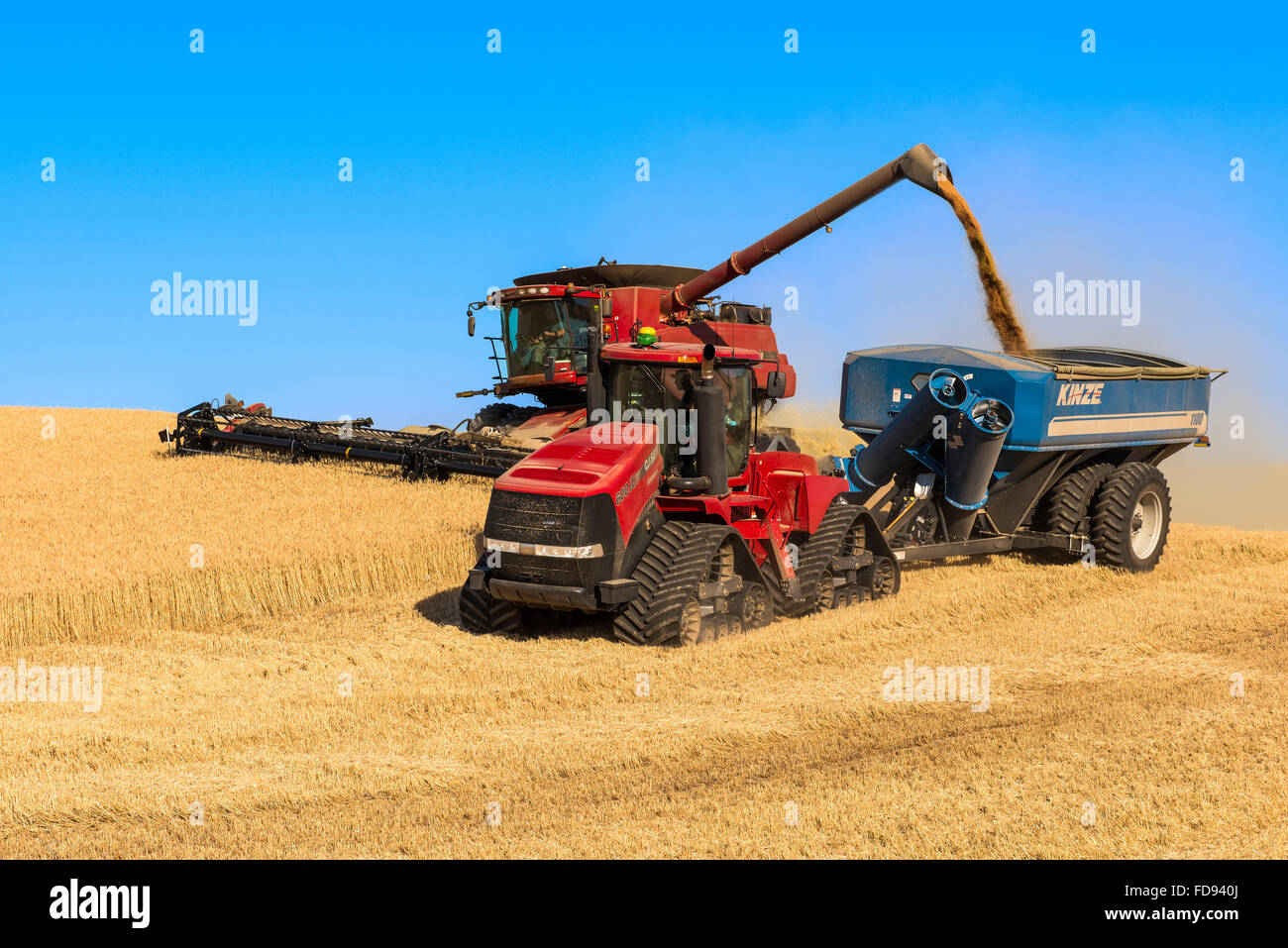 Tractor pulling grain cart hi-res stock photography and images - Alamy
