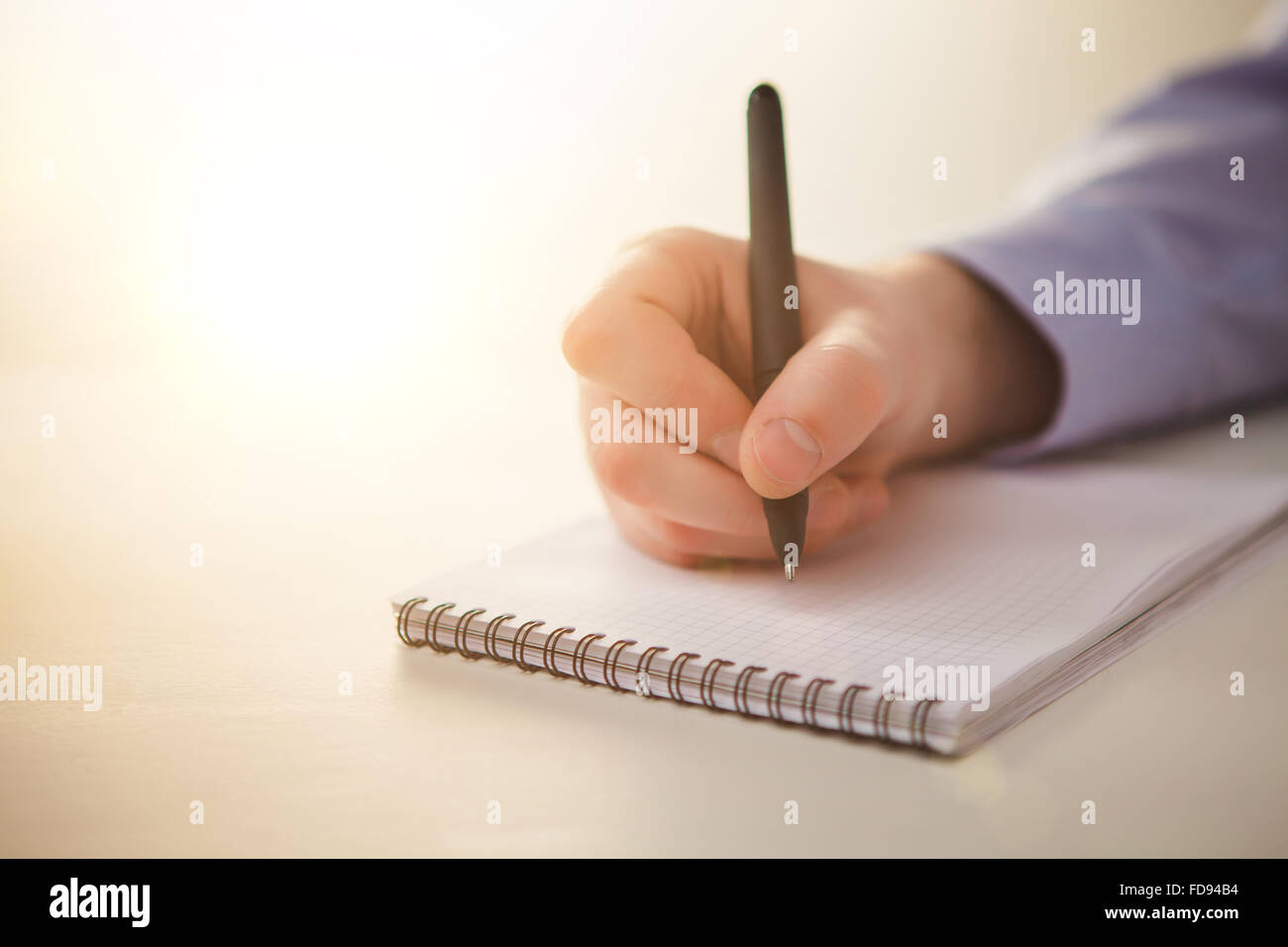 The male hand with a pen Stock Photo - Alamy