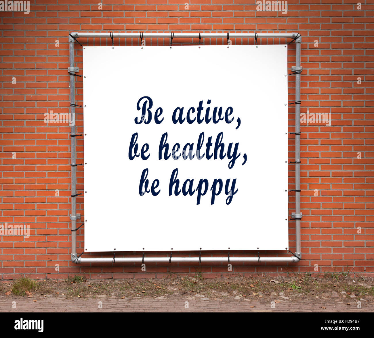 Large banner with inspirational quote on a brick wall - Be active, be ...
