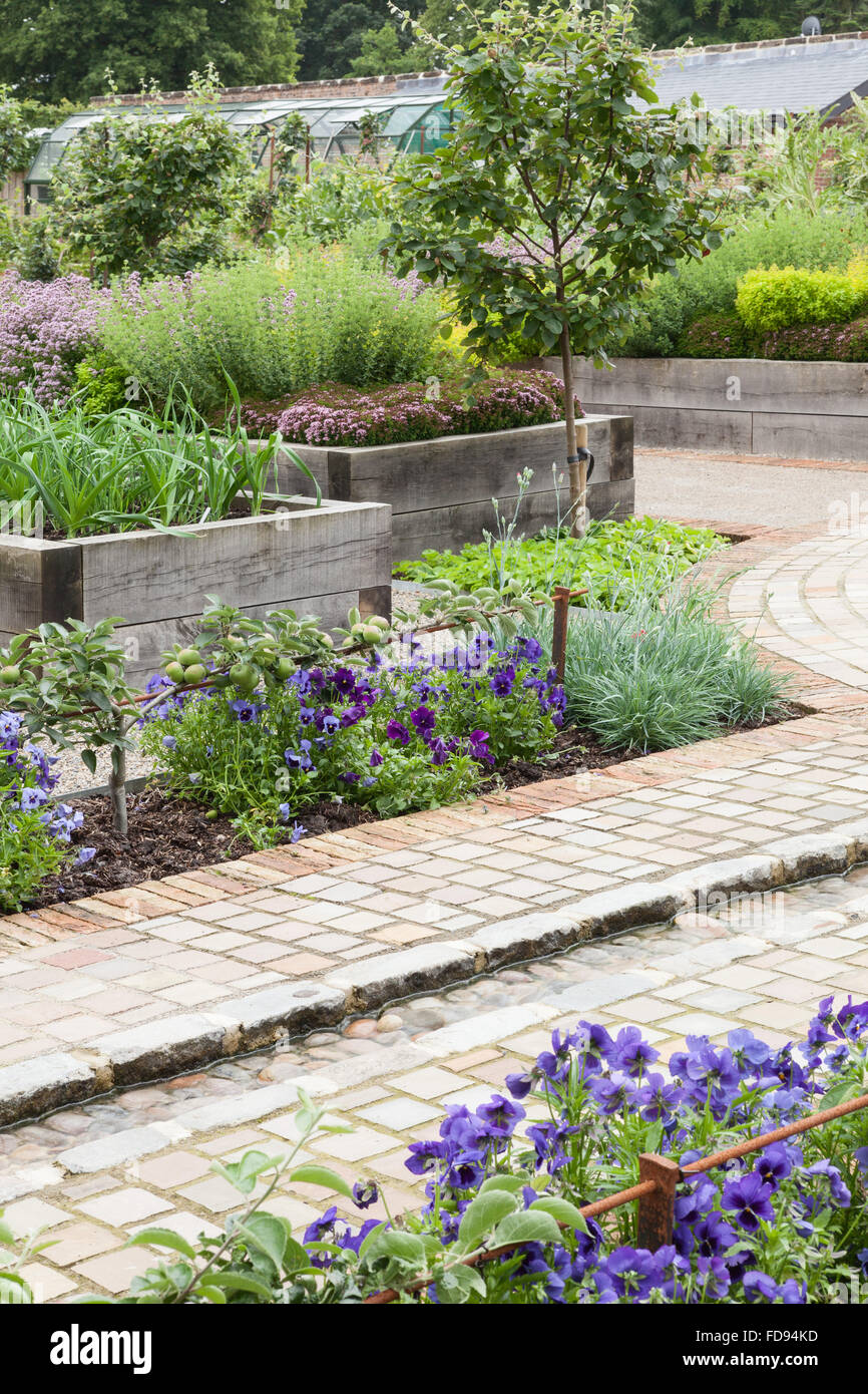 A shallow rill water feature. The Kitchen Garden at Rudding Park, North ...