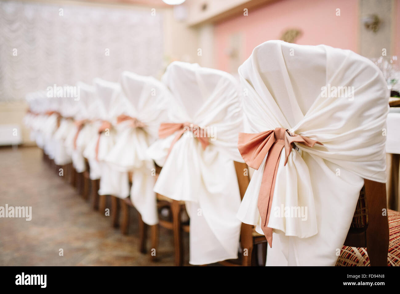 Banquet wedding chairs setting on evening reception awaiting guests ...