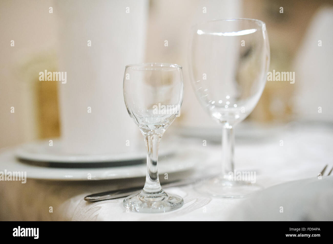 Banquet wedding table setting with plate and wineglass or glass Stock ...