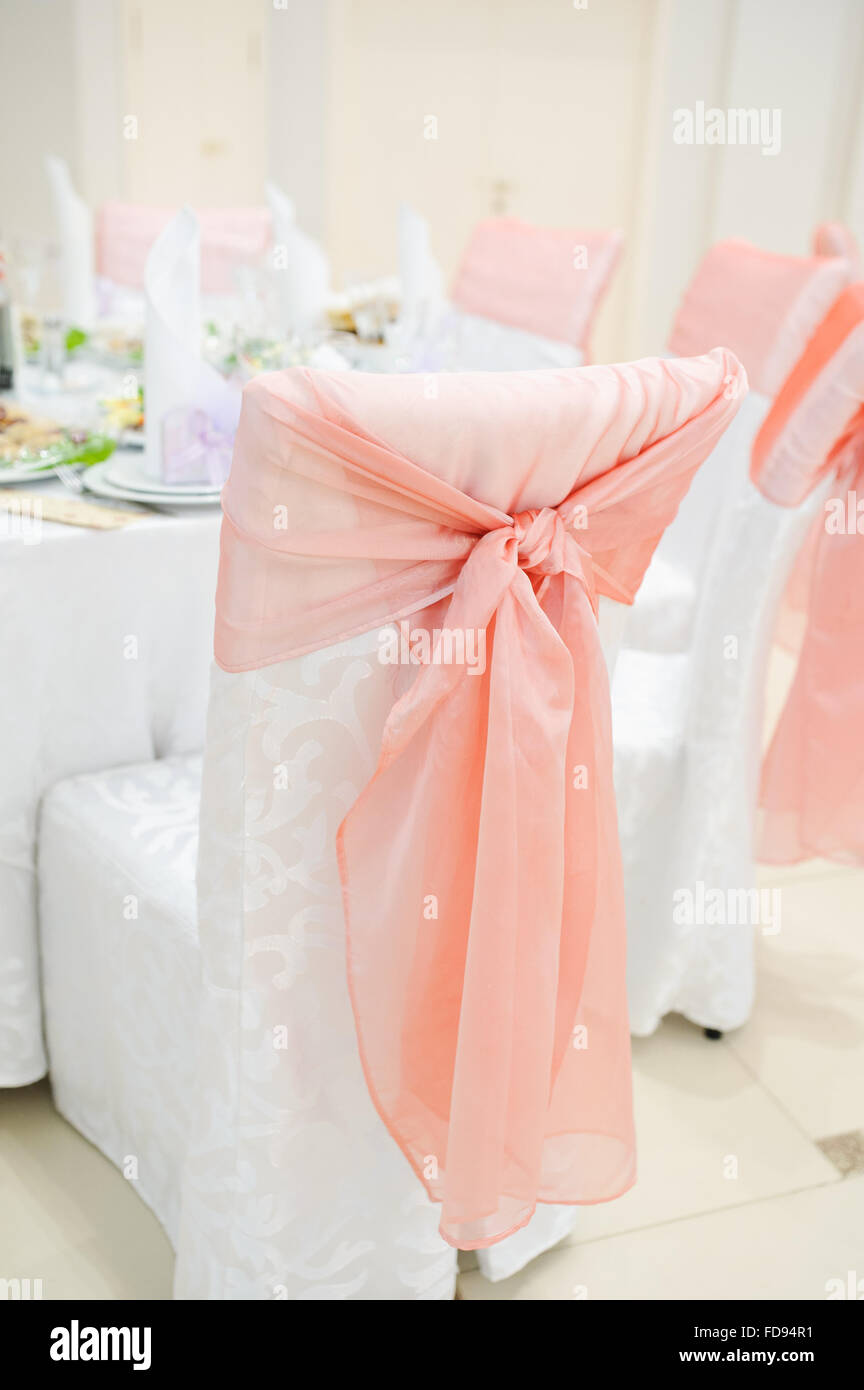 Banquet wedding chairs setting on evening reception awaiting guests ...