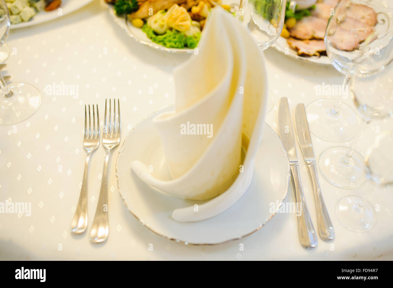 Banquet wedding table setting with plate, spoon, fork and knife Stock ...