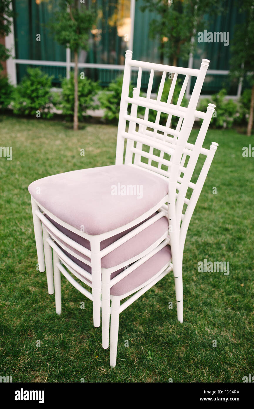 Banquet wedding chairs setting on evening reception awaiting guests ...