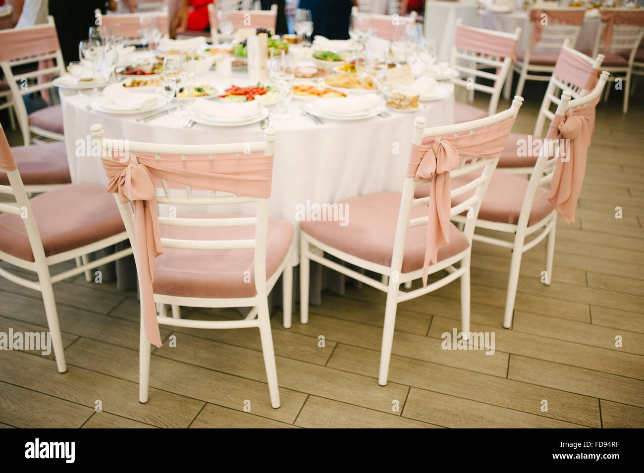 Banquet wedding chairs setting on evening reception awaiting guests ...