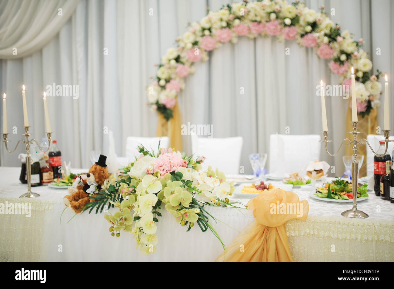 Banquet wedding table setting on evening reception awaiting guests ...