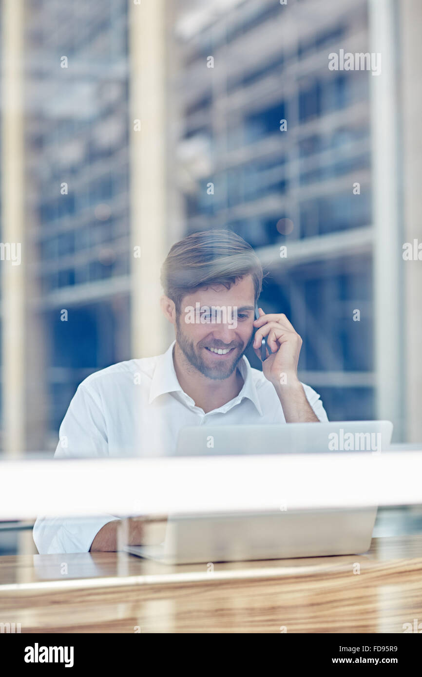 Friendly staff ready for your call Stock Photo - Alamy