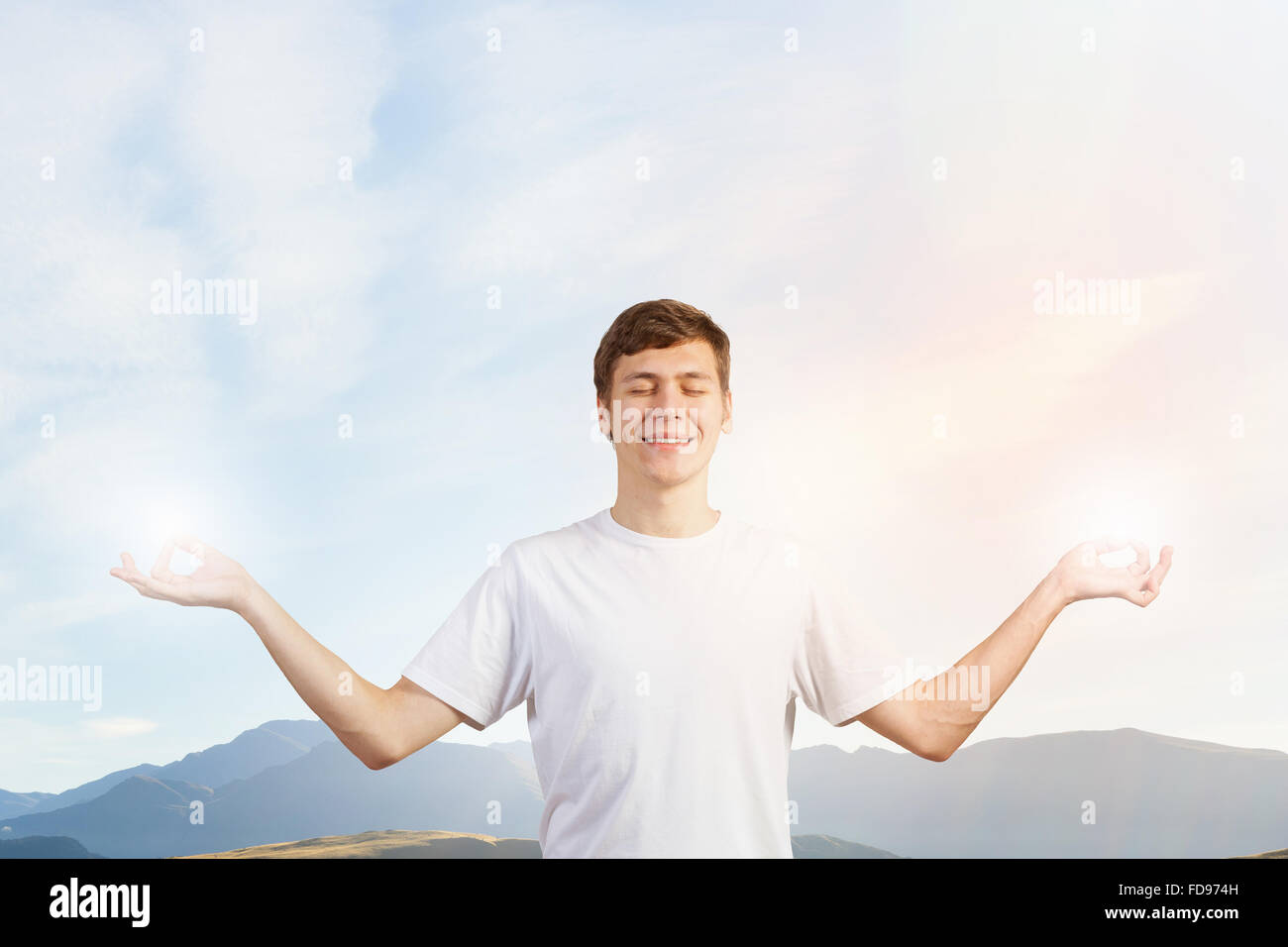 Young man representing soul balance and meditation concept Stock Photo ...
