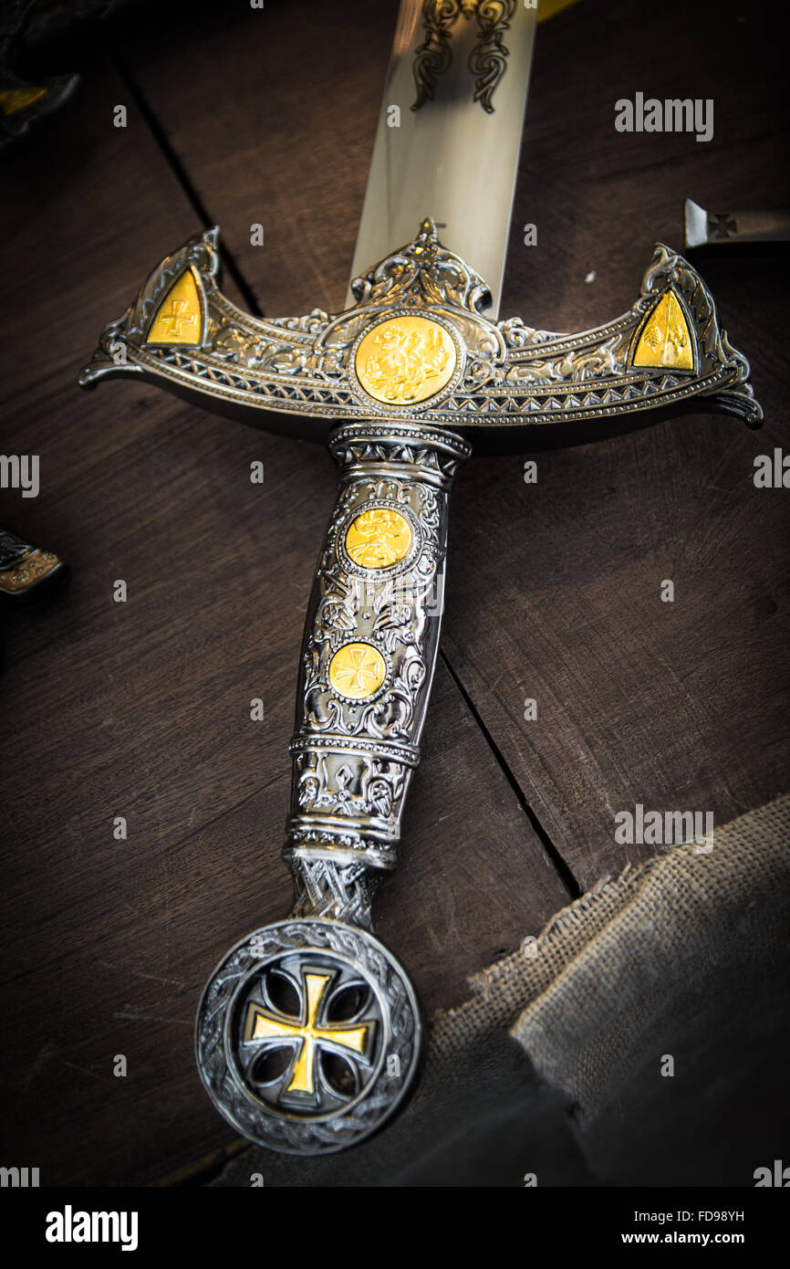 Ornate hilt medieval sword hi-res stock photography and images - Alamy