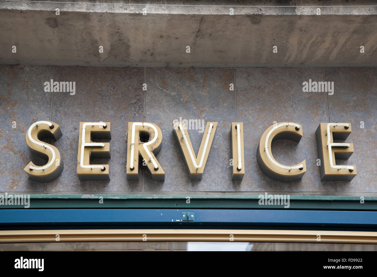 Service Sign on Stone Wall Stock Photo - Alamy