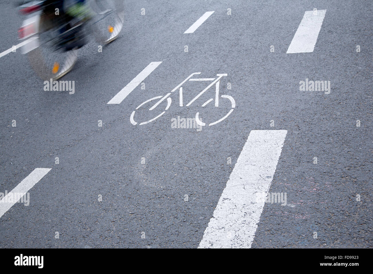 Bike Lane Sign and Cyclist in Cologne, Germany Stock Photo - Alamy